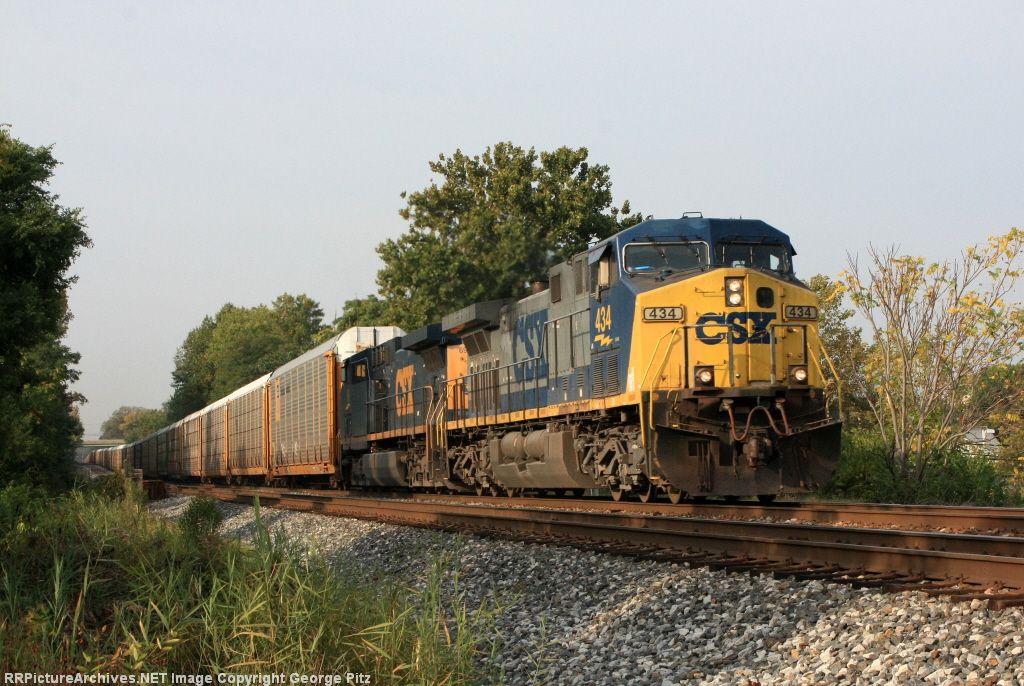 CSX 434 and train Q218